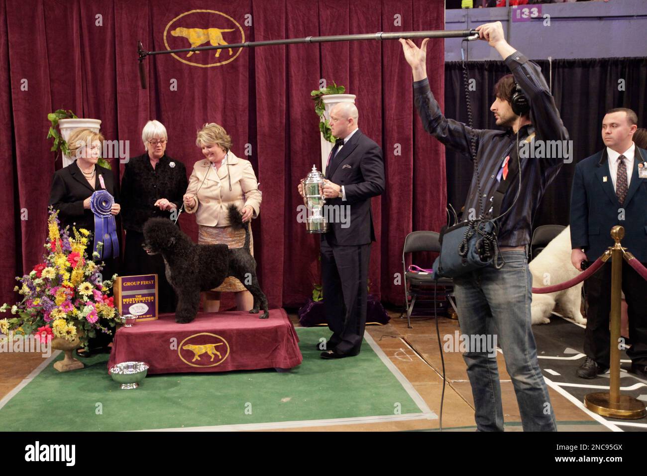 Portuguese water dog Ladybug's handler, Amy Rutherford, third from left ...