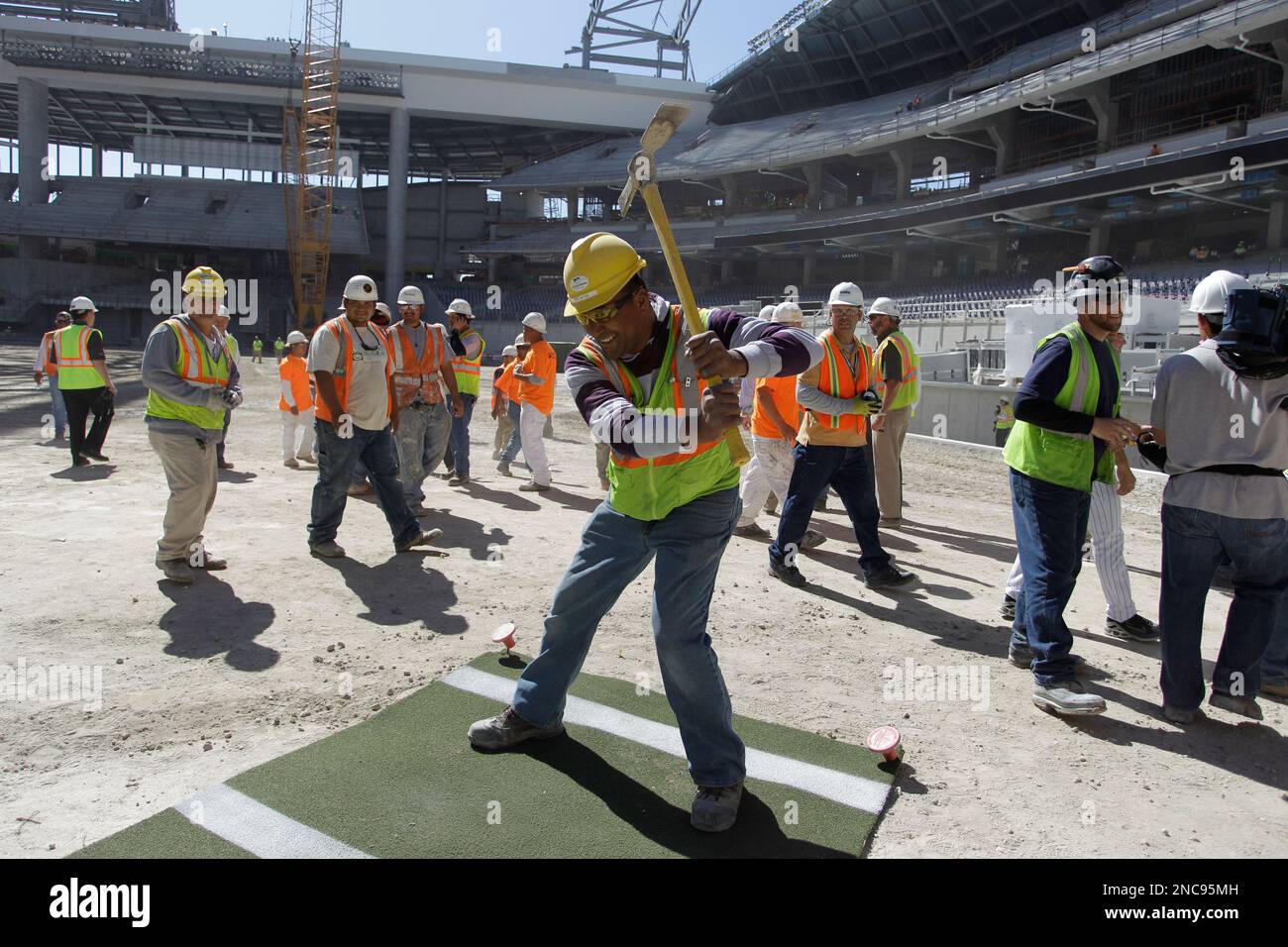 Construction workers at the new ball park during a tour of the new ...