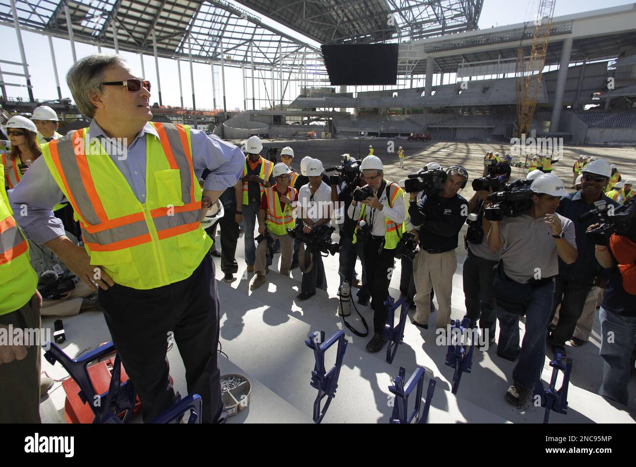 David Samon, the president of the Florida Marlins, displays the first ...