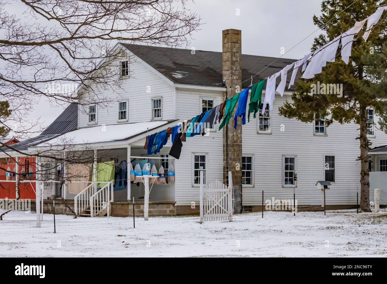 Laundry hanging from a high clothesline on a pulley at an Amish farm in ...
