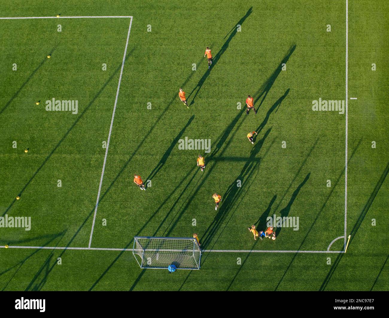 Young boys plays football - view from above Stock Photo - Alamy