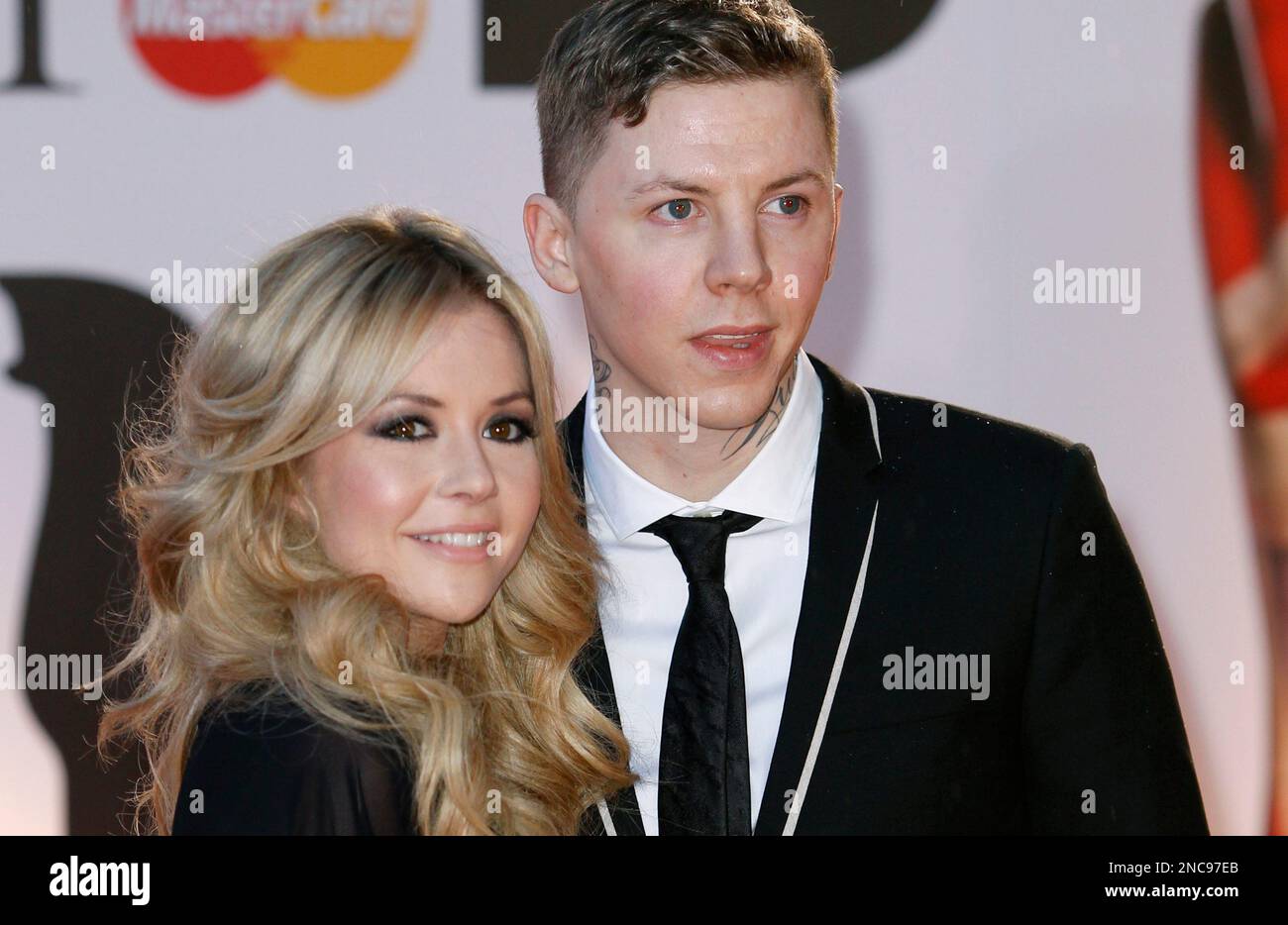Professor Green, left, and Candy McCulloch arrive for the Brit Awards ...