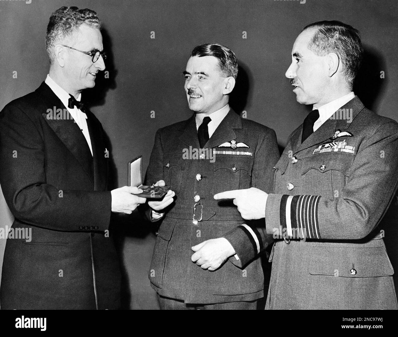 Air Commodore Frank Whittle, center, of the Royal Air Force, inventor ...
