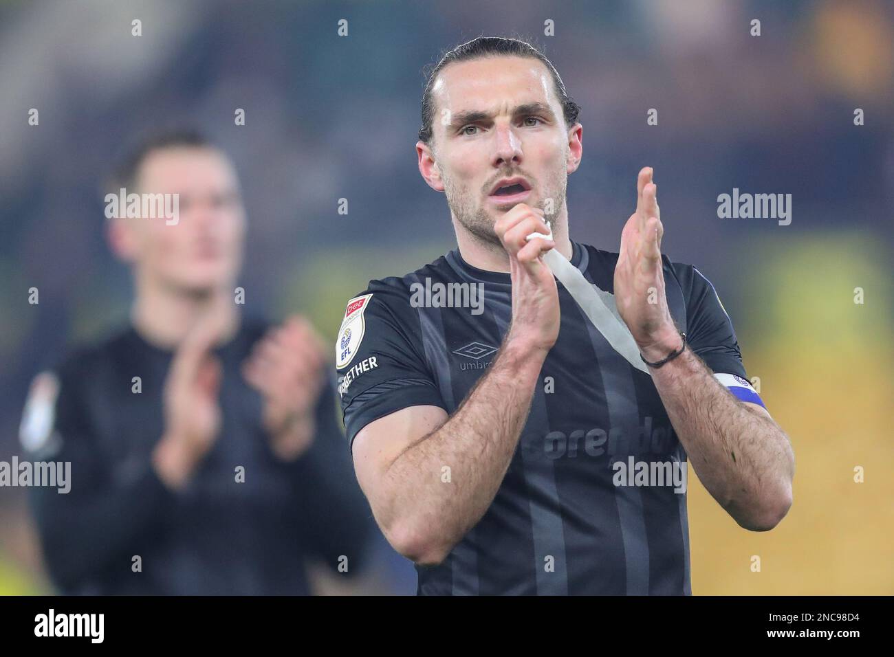 Lewis Coyle #2 of Hull City applauds the travelling fans after the Sky ...