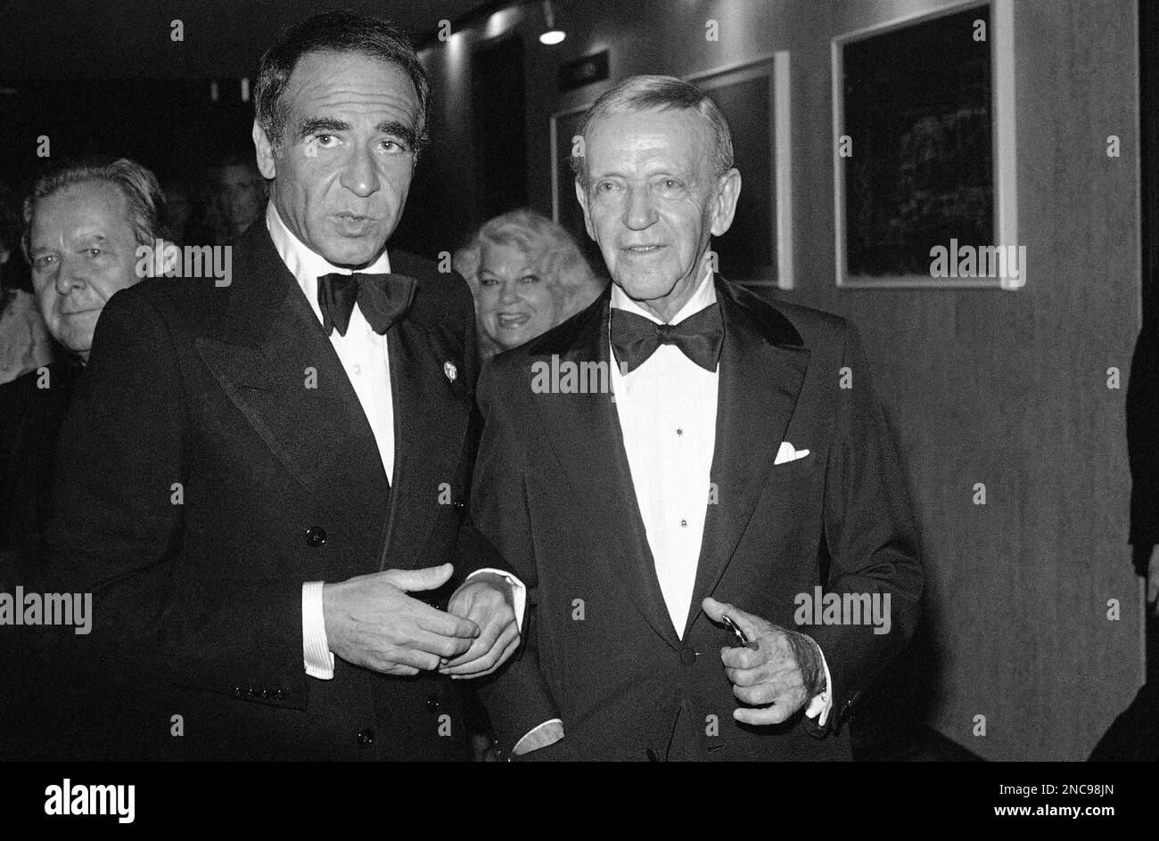 Fred Astaire and Dan Melnick, head of Columbia pictures, are pictured ...