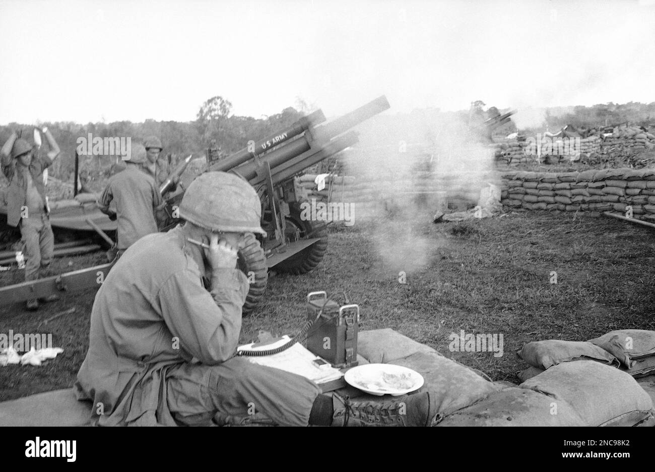 U.S. 1st infantry division radioman gets instructions for firing orders ...