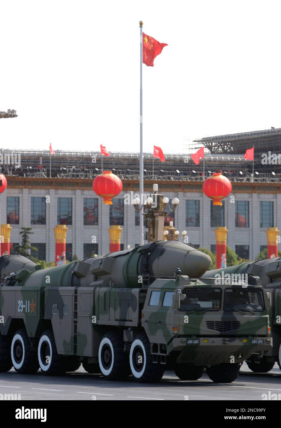 FILE - In this Oct. 1, 2009 file photo, military vehicles carrying the ...