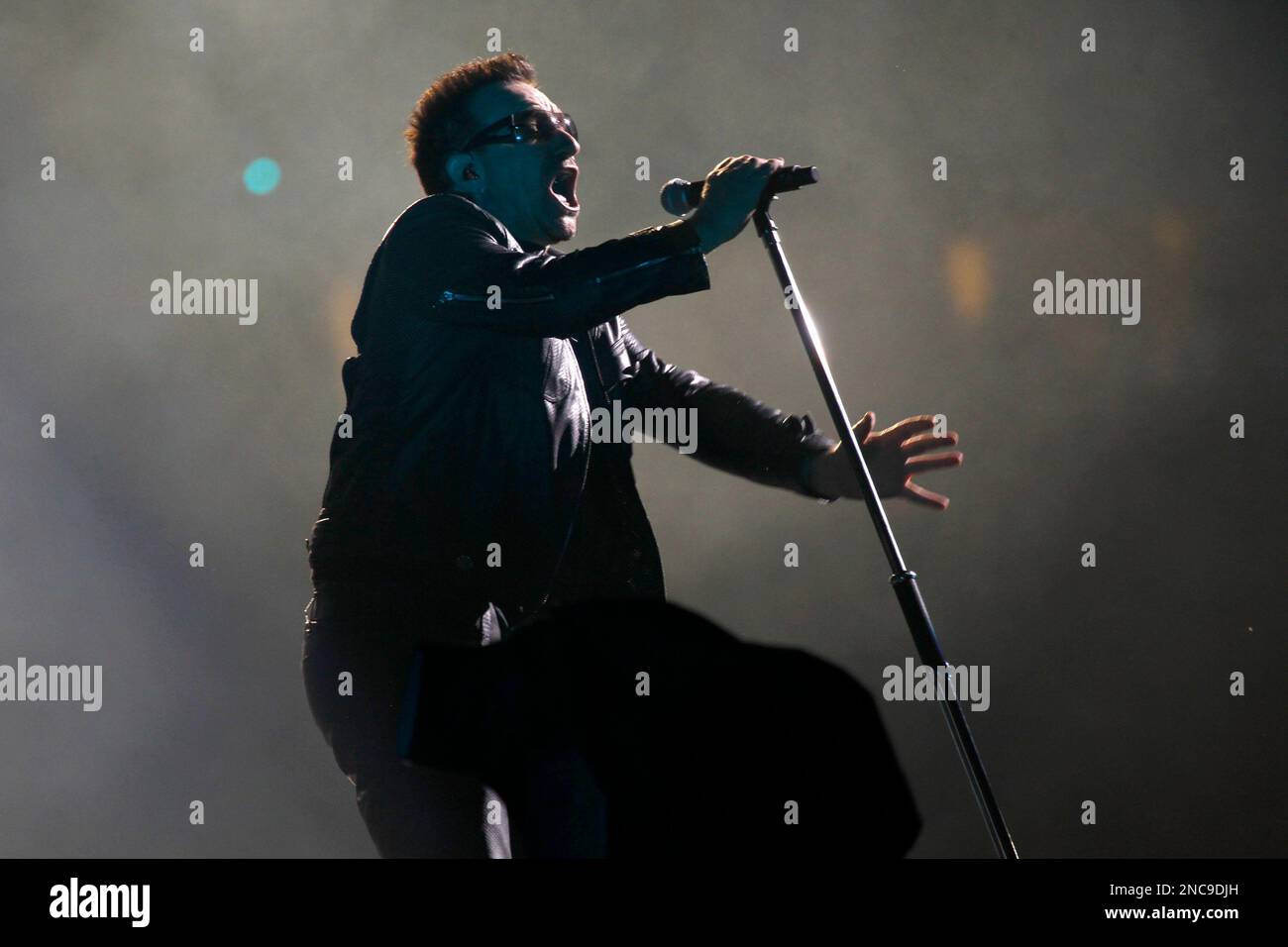 Bono, lead singer of Irish band U2, performs during their concert, at ...