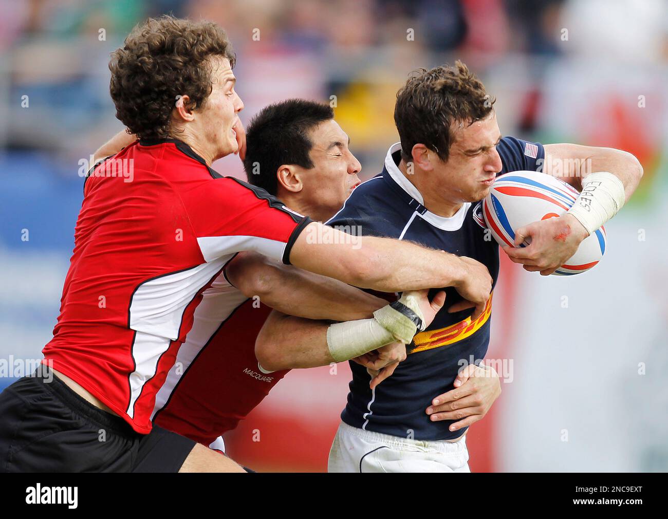 Zack Test of the united states fights off the Canadian defense during ...