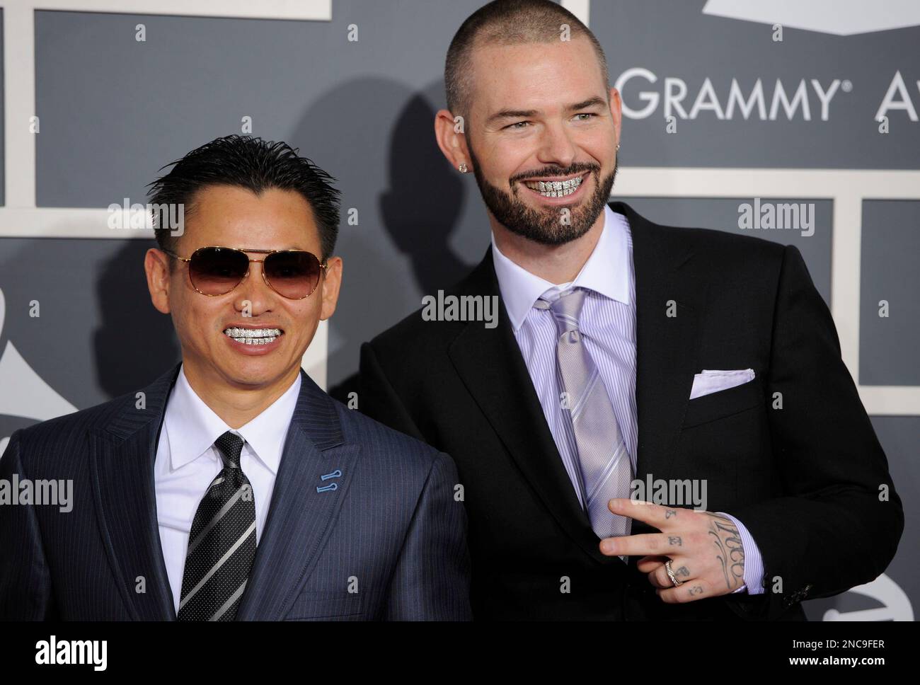 Johnny Dang, left, and Paul Wall arrive at the 53rd annual Grammy ...