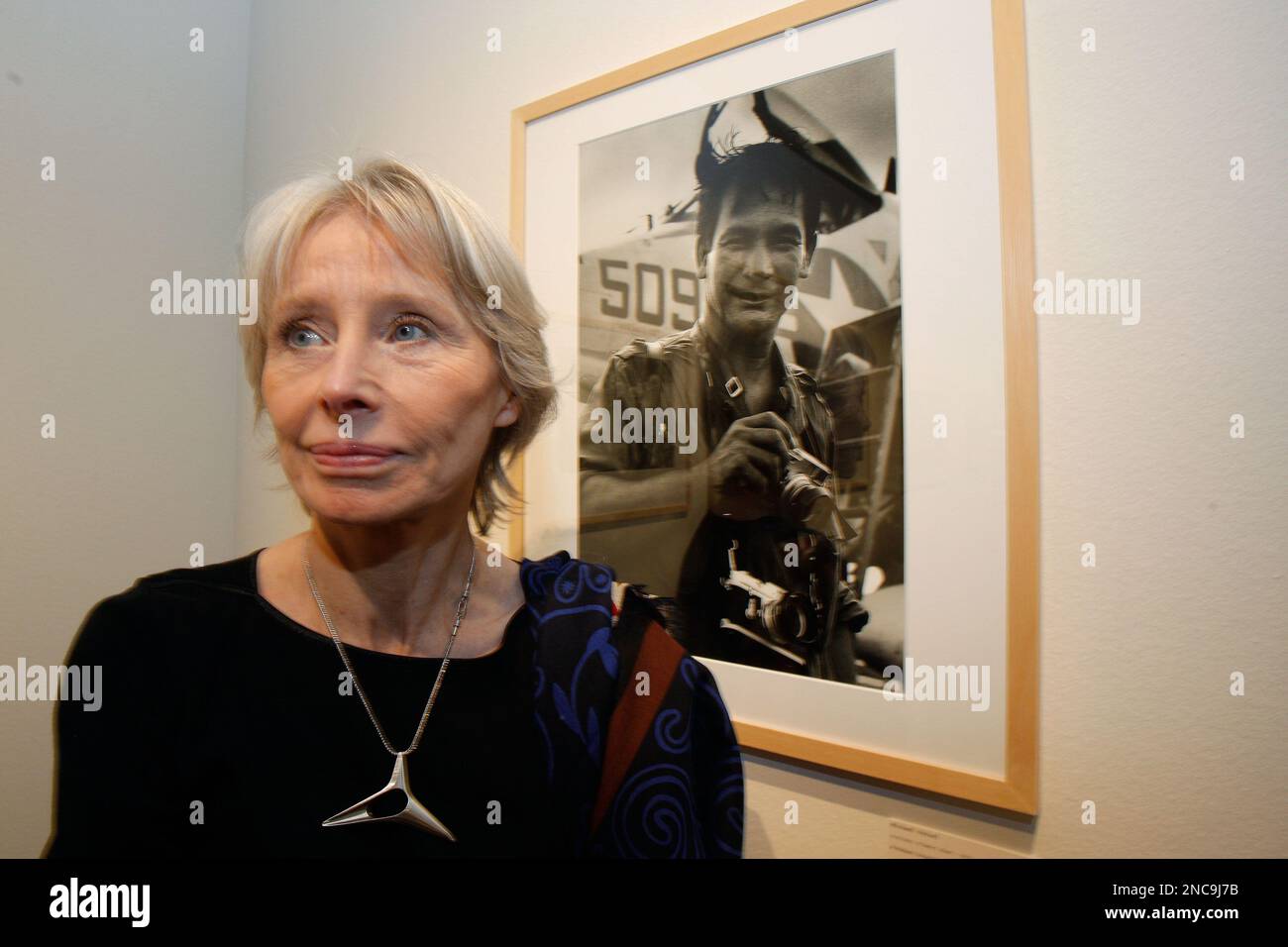 Cecile Blumental, nee Schrouben, friend of Henri Huet, stands next to a ...