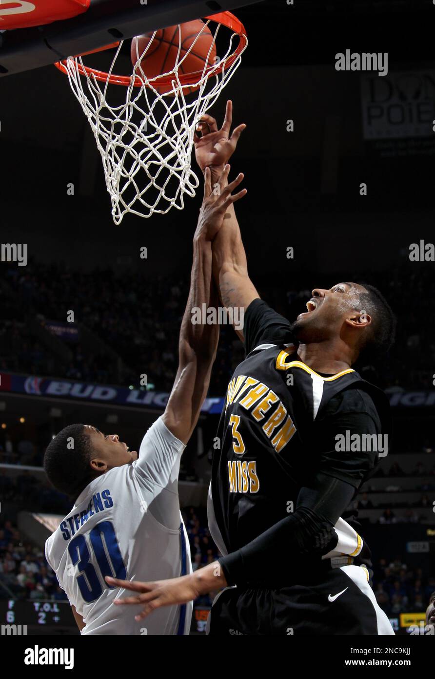 Southern Miss forward Josimar Ayarza (3) shoots as Memphis forward D.J ...