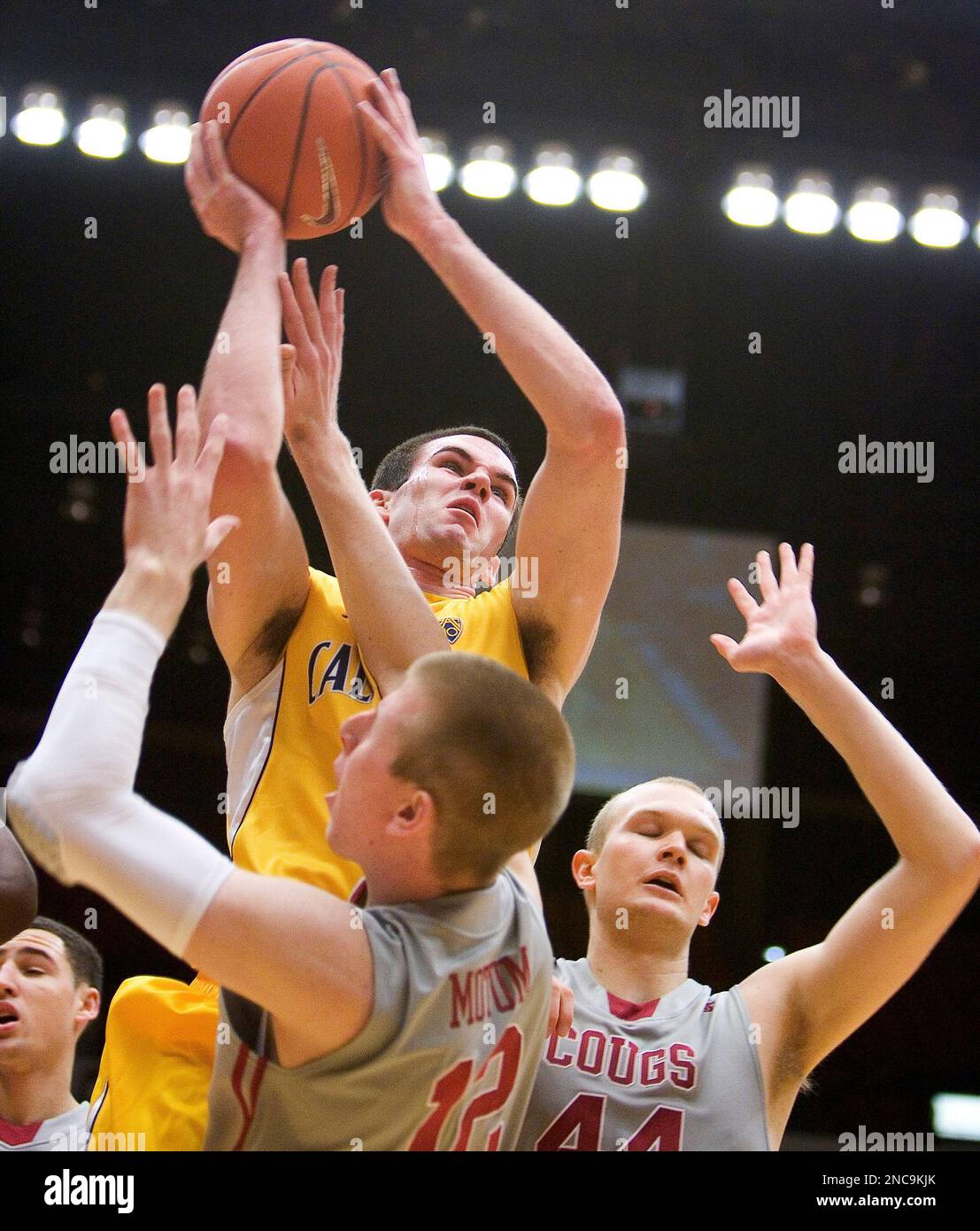California guard Jeff Powers, top, shoots over Washington State forward ...