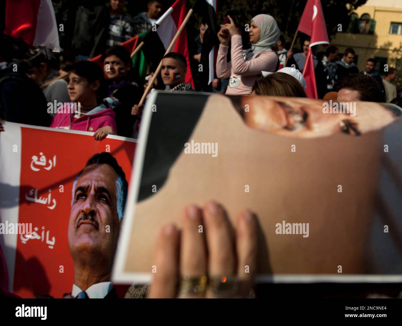 Israeli Arabs hold flags and pictures of late Egyptian leader Gamal ...