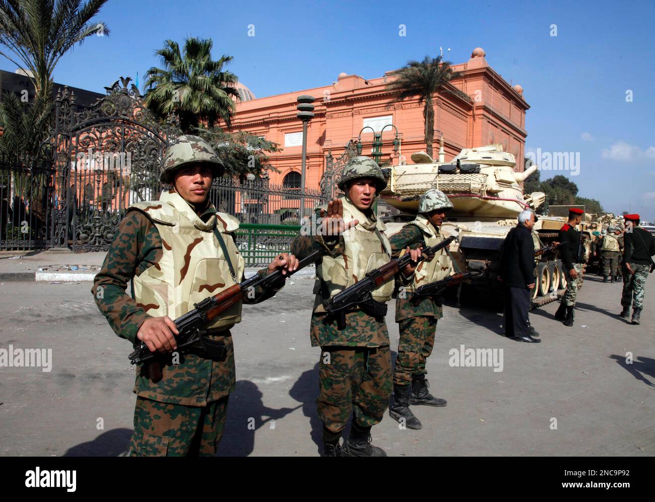 Egyptian army soldiers stand in front of the Egyptian museum at Tahrir ...