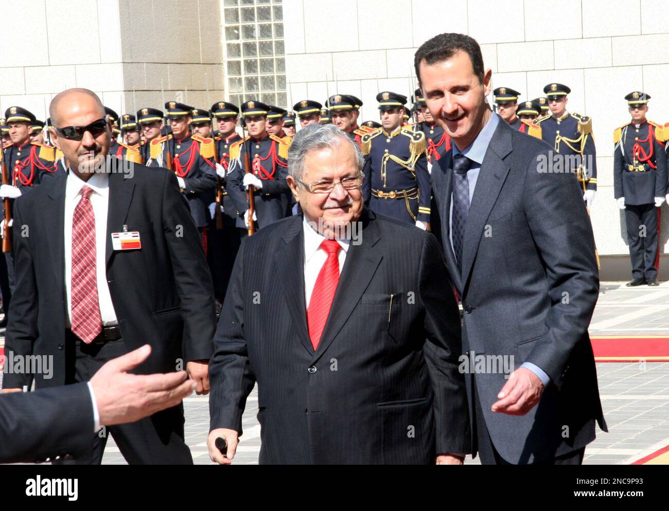 Syrian President Bashar Assad, right, receives his Iraqi counterpart ...