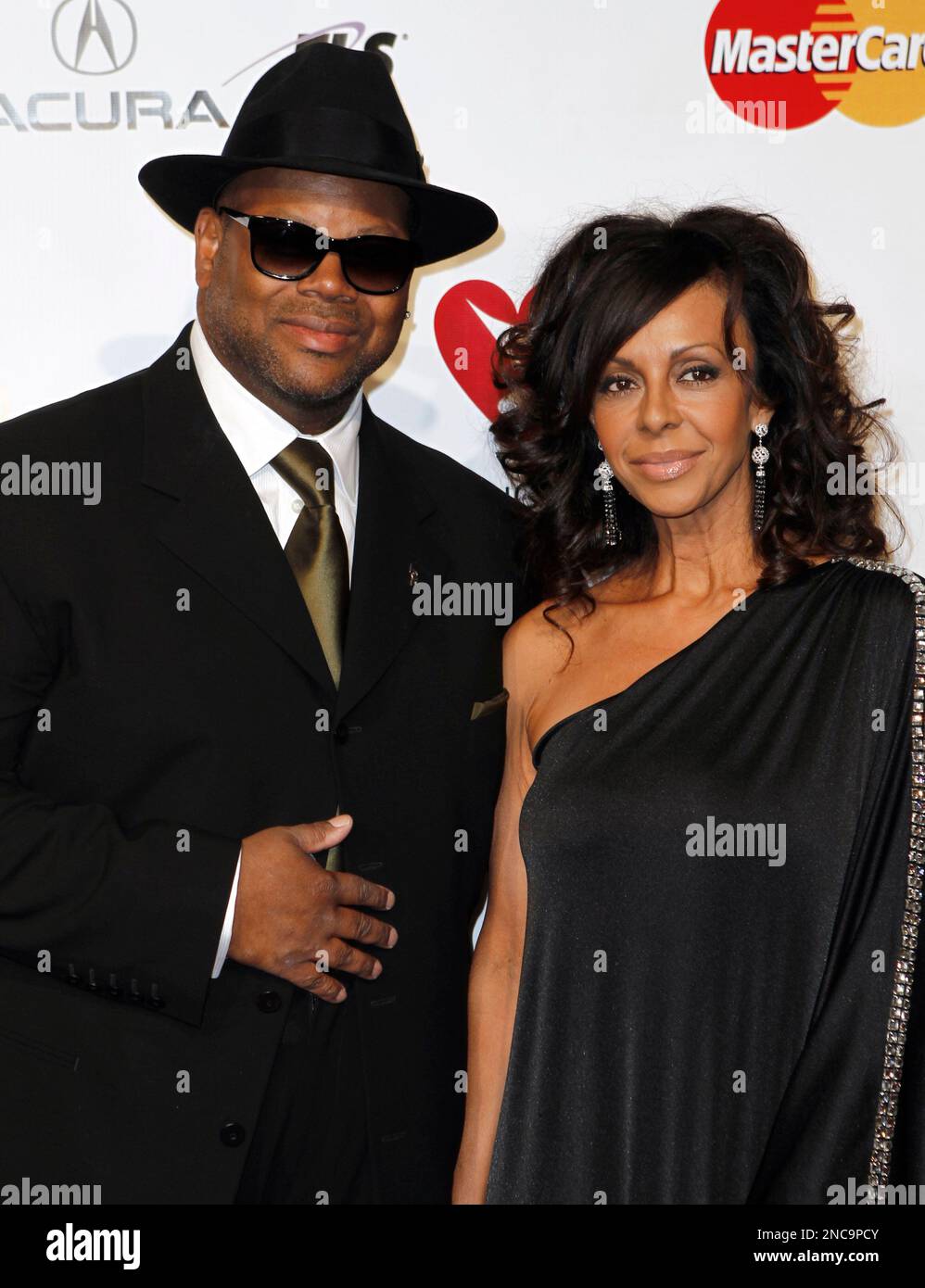 Jimmy Jam, left, and Lisa Padilla arrive at the MusiCares Person of the ...
