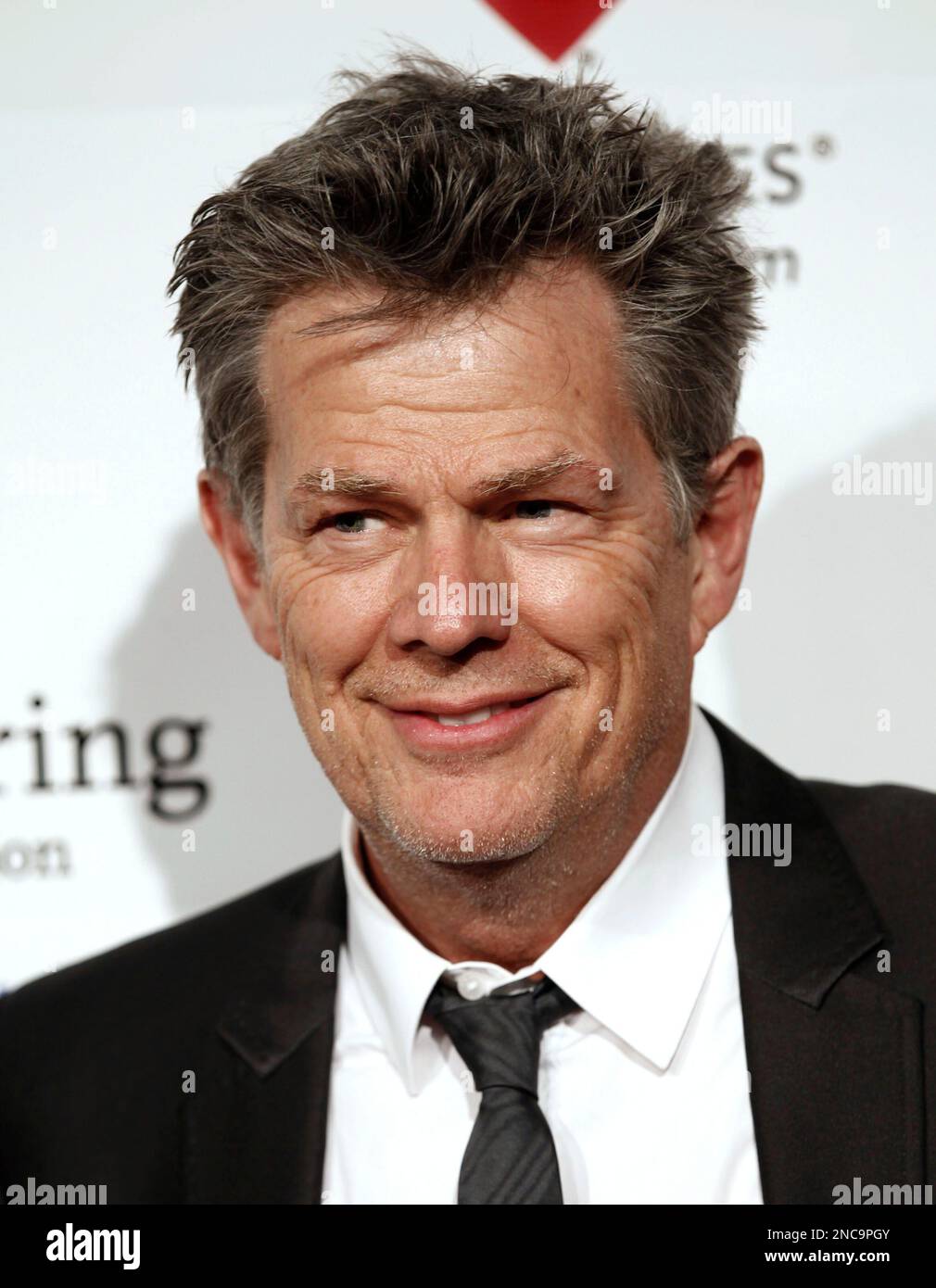 Producer David Foster arrives at the MusiCares Person of the Year gala ...