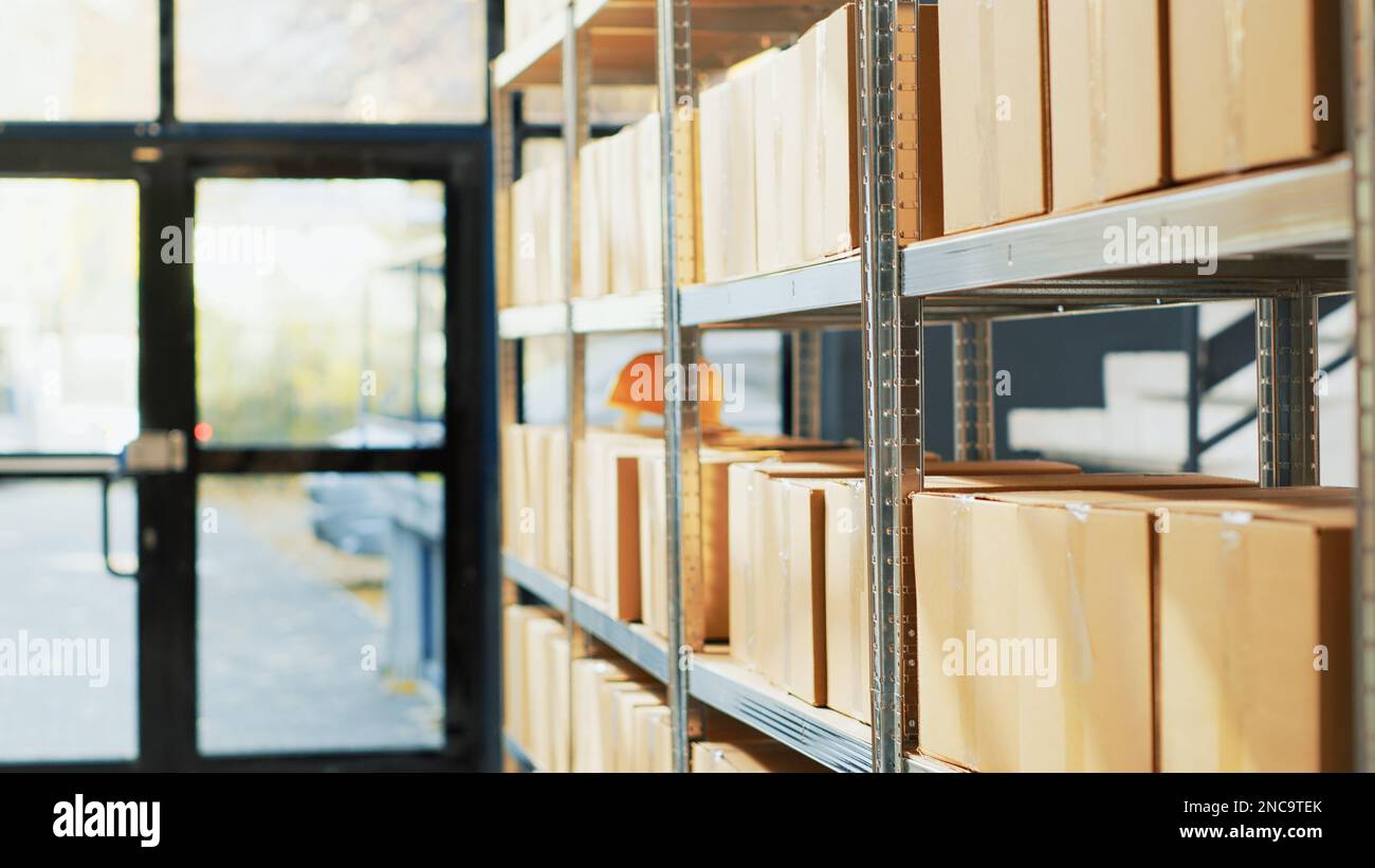 Multiple crdboard boxes placed on racks and shelves, merchandise or ...