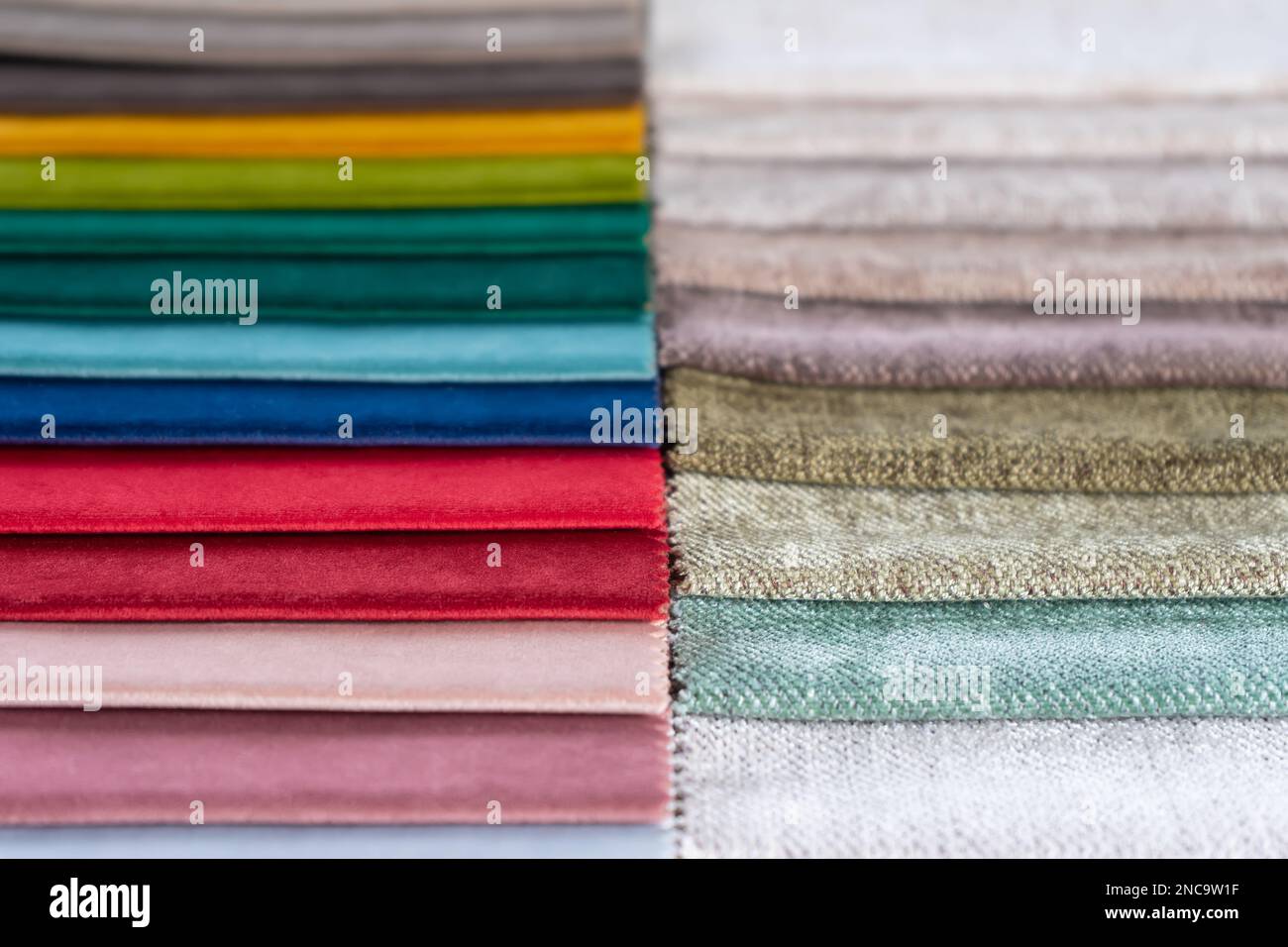 Bright collection of colorful textile samples. Fabric swatches, set in ...