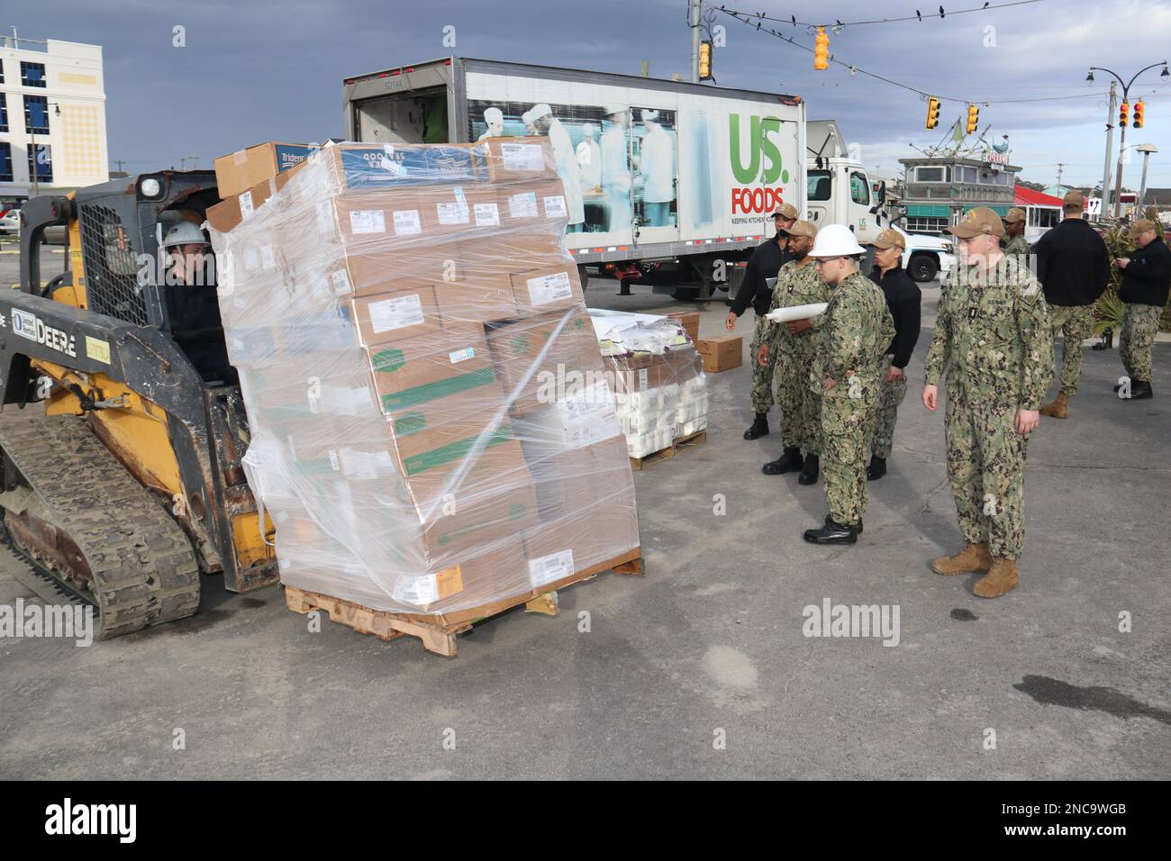 Atlantic Ocean, USA. 7th Feb, 2023. Sailors load a palette of food ...
