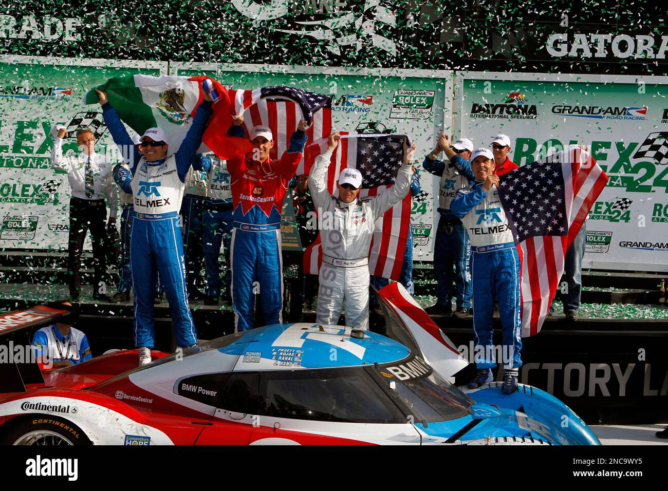 The winning drivers of the Grand Am Rolex 24 hour auto race, from left ...