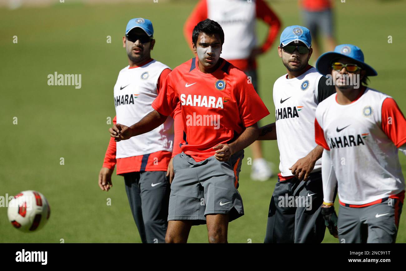 Indian cricketers, from left, captain Mahendra Singh Dhoni ...