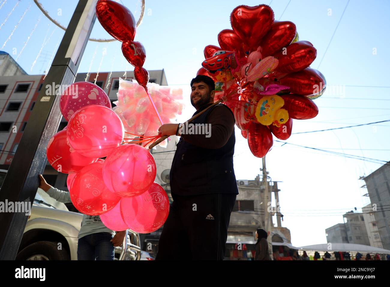 Gaza. 14th Feb, 2023. A vendor sells balloons on Valentine's Day on a ...