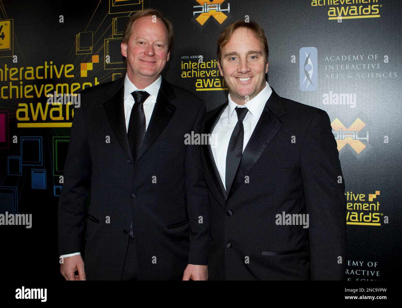 Academy of Interactive Arts & Sciences President, Martin Rae, left, and ...
