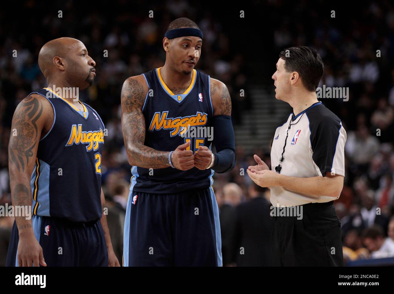 Denver Nuggets small forward Carmelo Anthony (15), center, and point ...