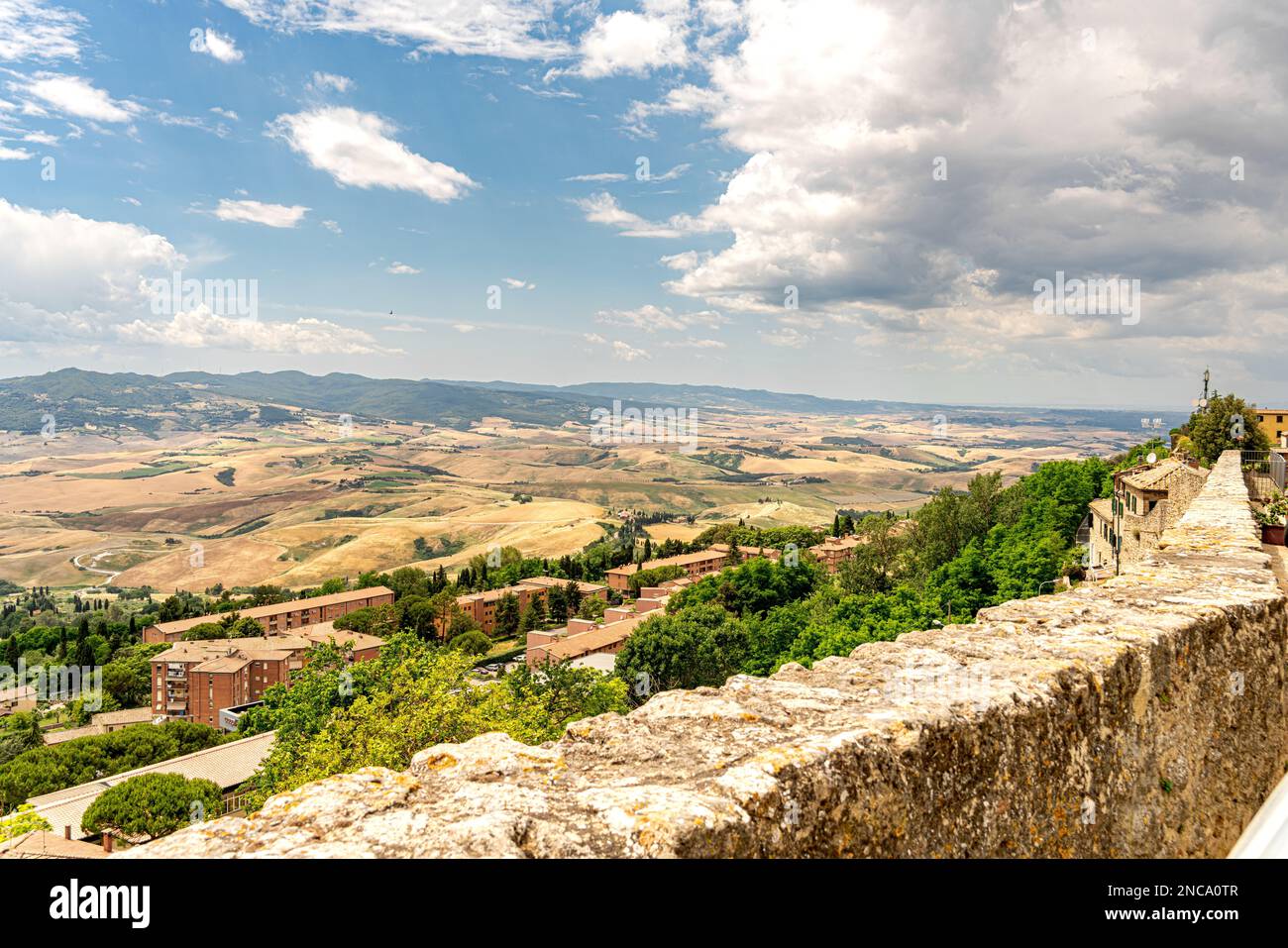 A beautiful scene of the landscape with houses surrounded by trees and ...