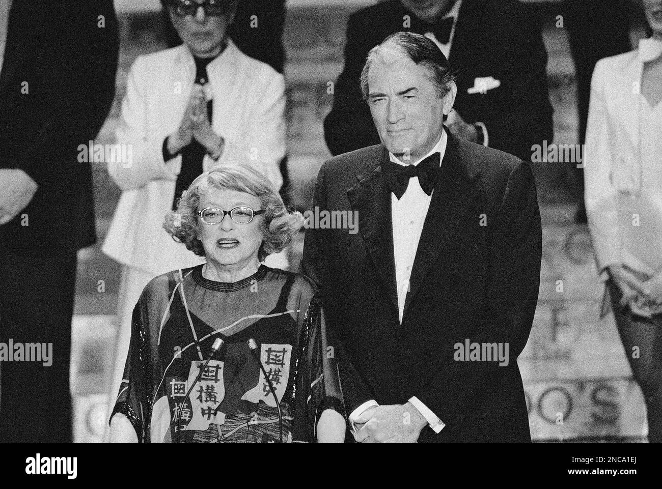 Veteran performers Bette Davis and Gregory Peck explain the voting procedures in opening remarks ...
