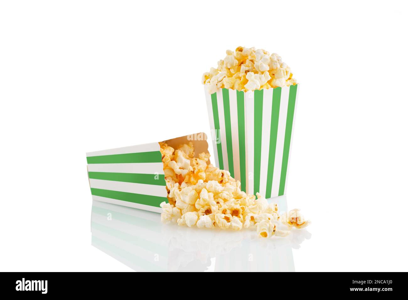 Two green white striped carton buckets with tasty cheese popcorn ...