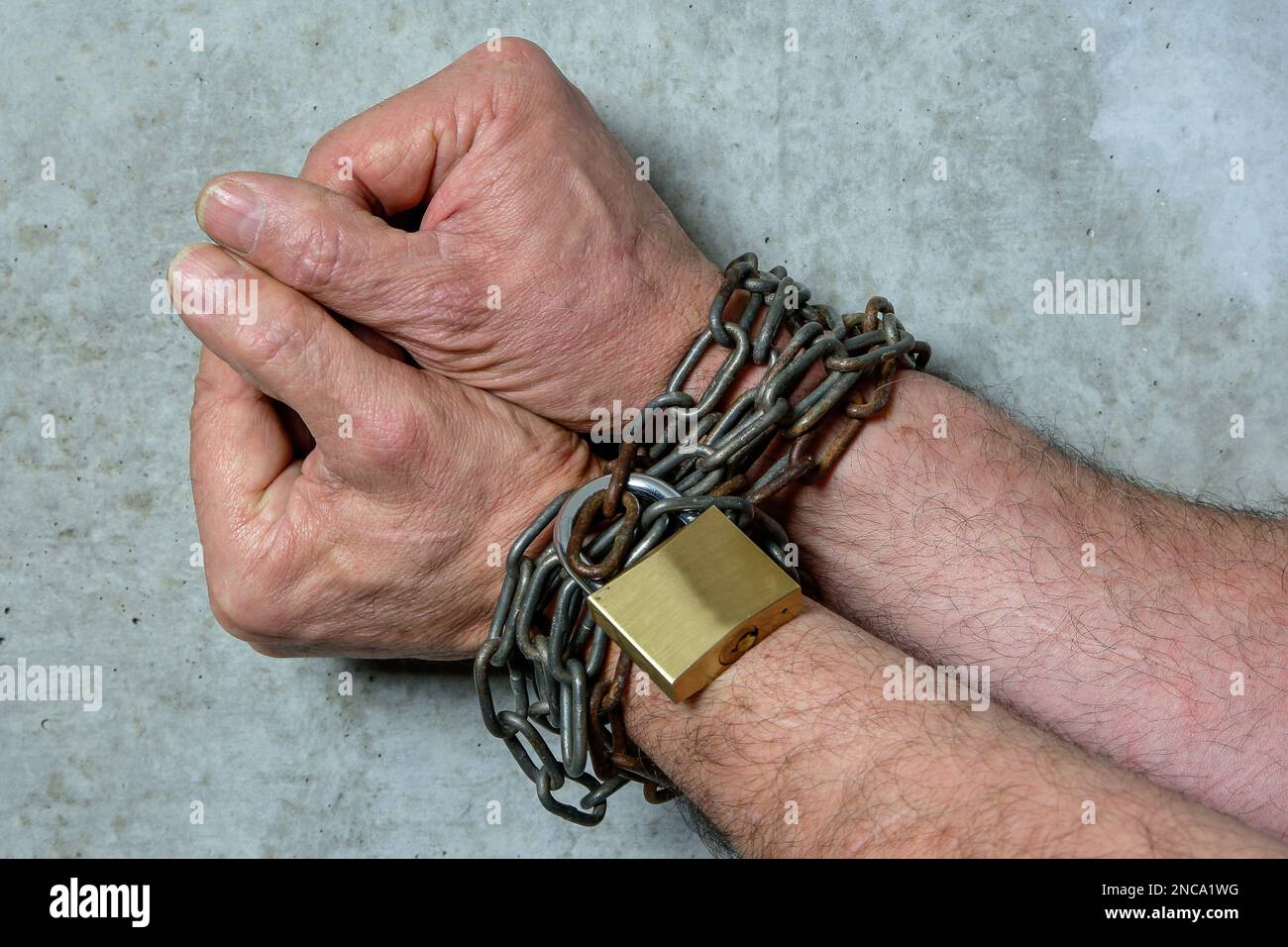 Autocracy, the end of freedom. Hands bound with steel chain Stock Photo ...