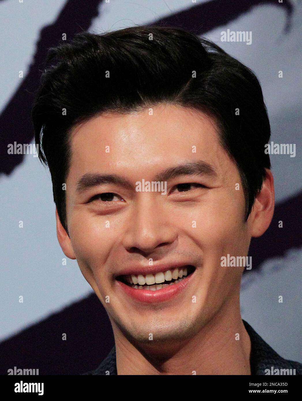South Korean actor Hyun Bin smiles after a press preview of his movie ...