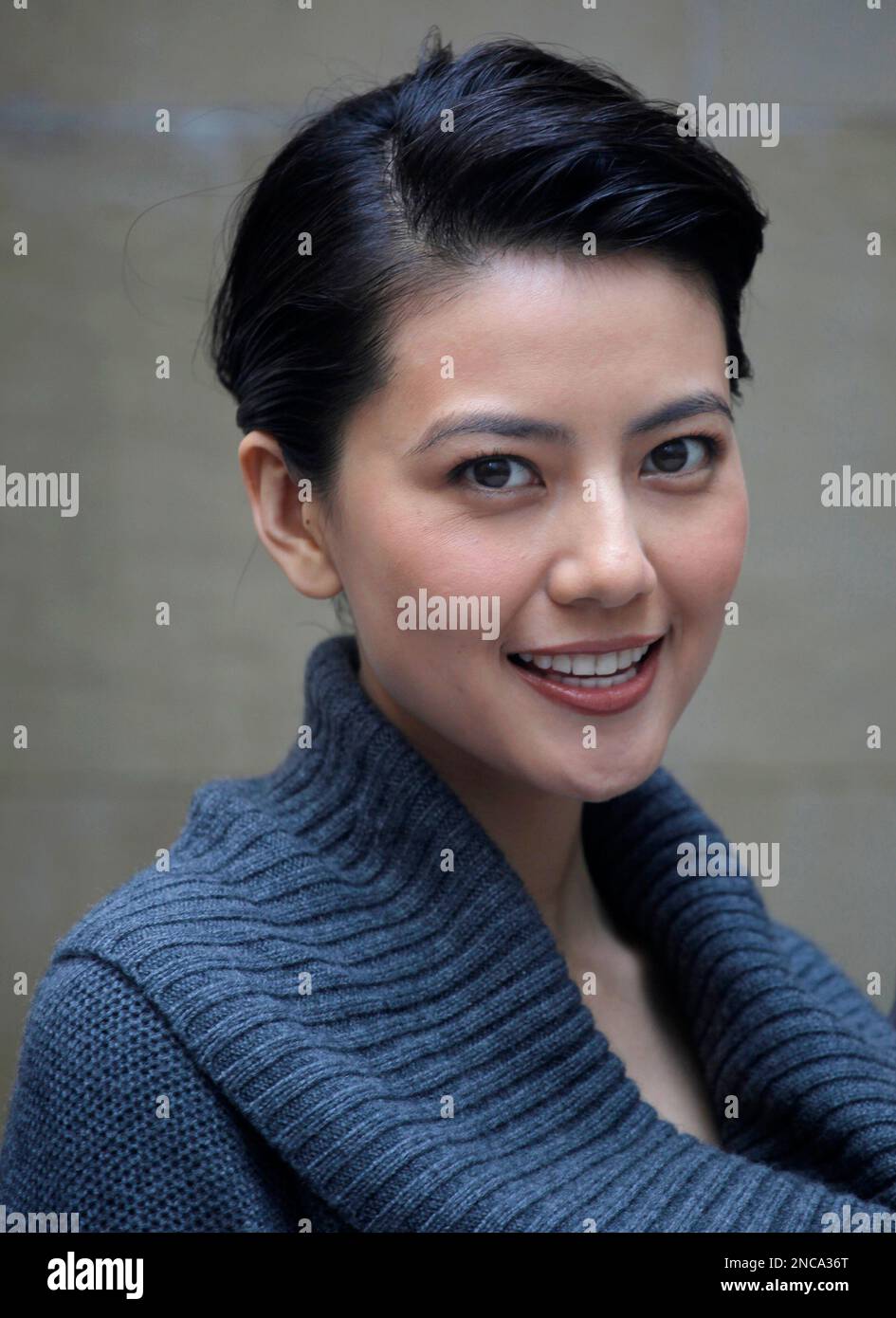 Chinese actress Gao Yuanyuan poses for photographers before the preview ...