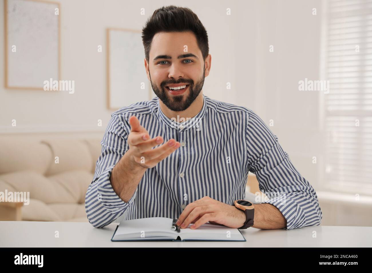 Male tutor conducting remote hi-res stock photography and images - Alamy
