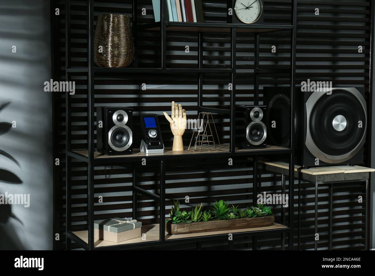 Modern powerful audio speaker system on shelving indoors Stock Photo ...