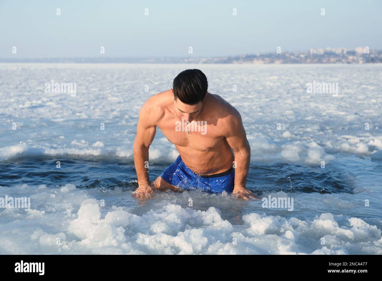 Ice hole swimming man hi-res stock photography and images - Alamy