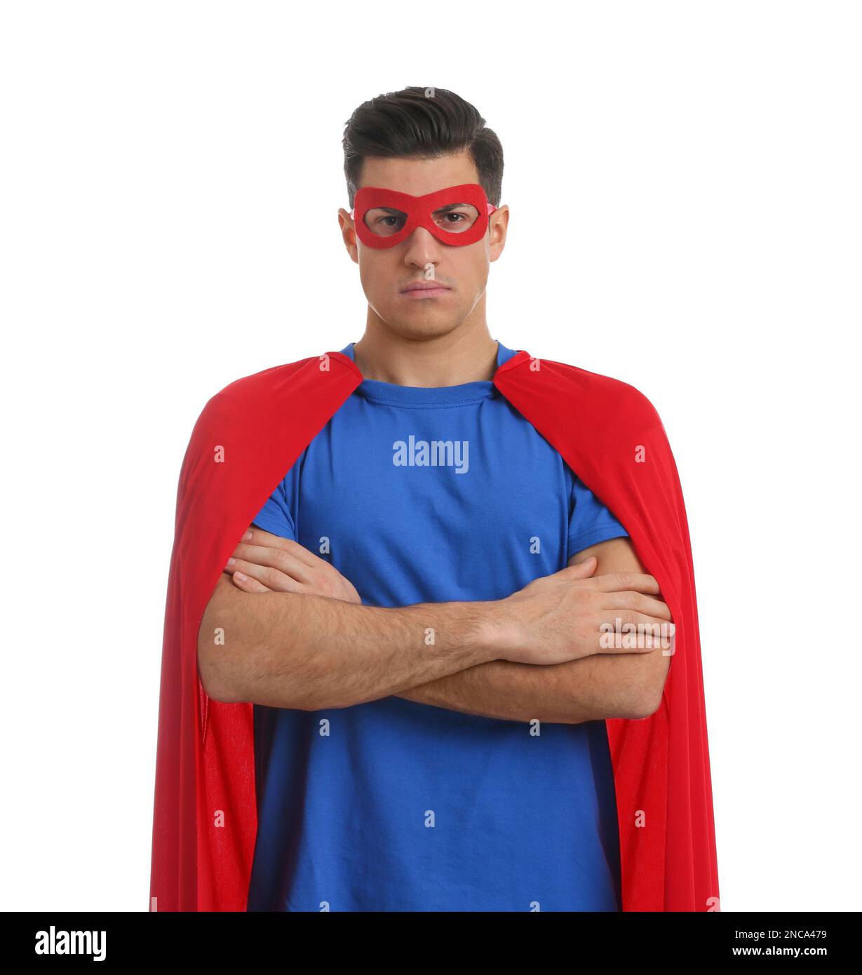 Man wearing superhero cape and mask on white background Stock Photo - Alamy
