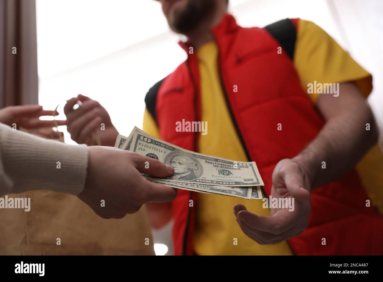 Woman receiving order paper hi-res stock photography and images - Alamy