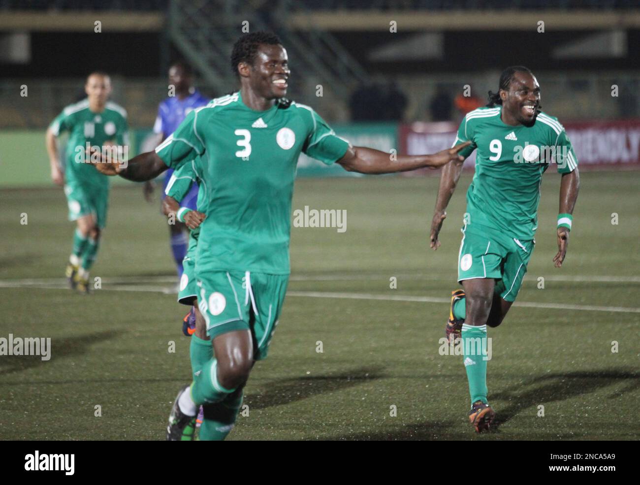 Nigeria's Taye Taiwo, center, celebrate after he scored a goal against ...