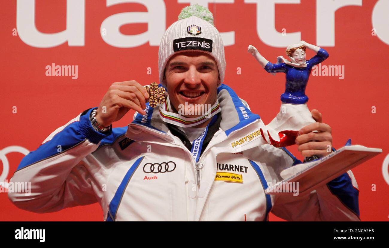 Men's super-G winner Christof Innerhofer of Italy poses with his gold ...
