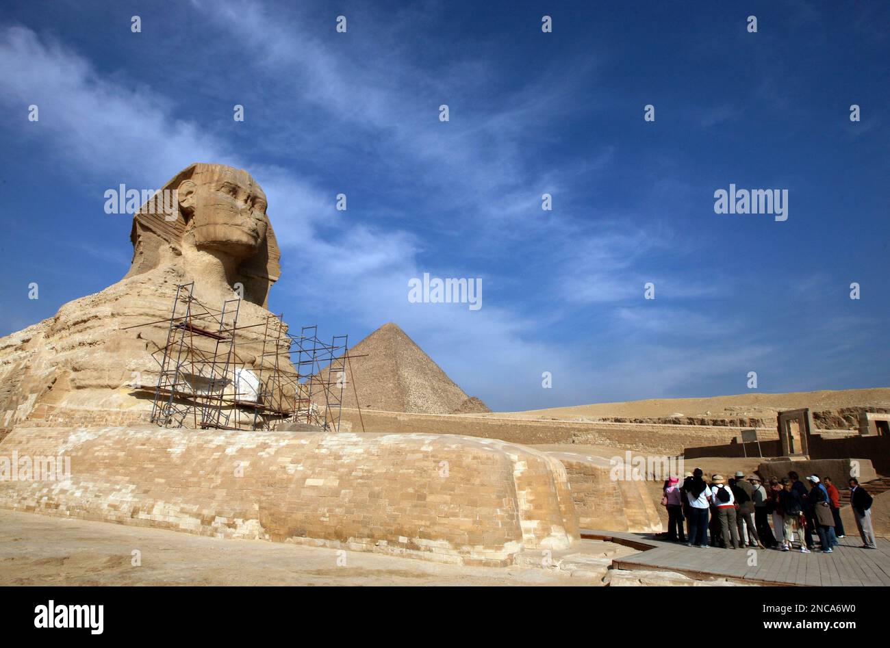 Tourists tour around the Sphinx and the pyaramids, in Giza, Egypt's ...