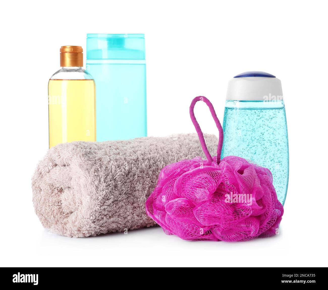 Personal hygiene products with towel and shower puff on white ...