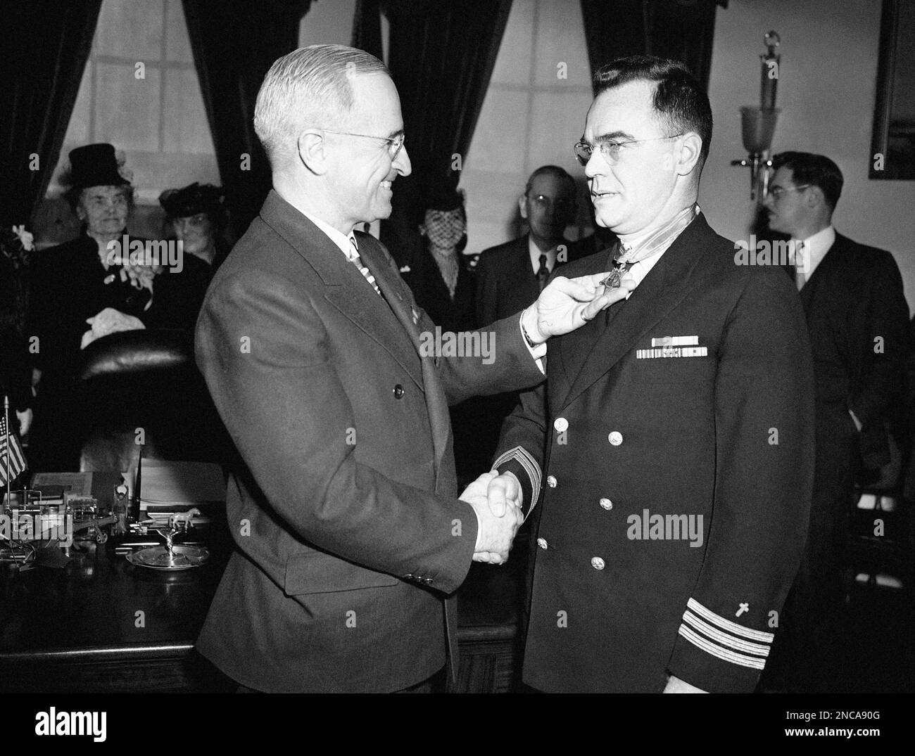 Cmdr. Joseph Timothy O’Callahan, right, of Cambridge, Mass., becomes ...