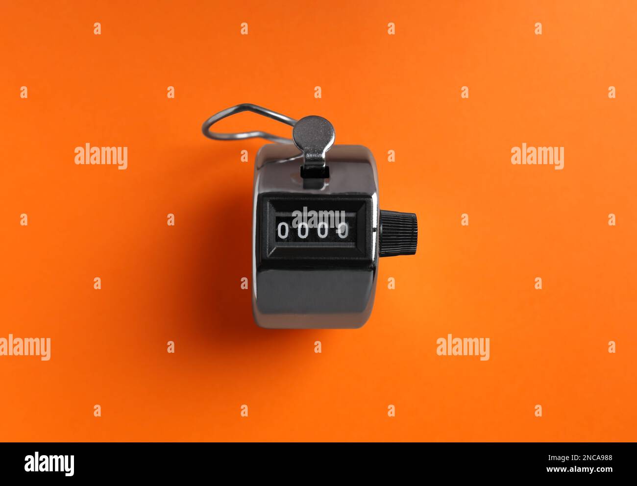Modern timer on orange background, top view Stock Photo - Alamy
