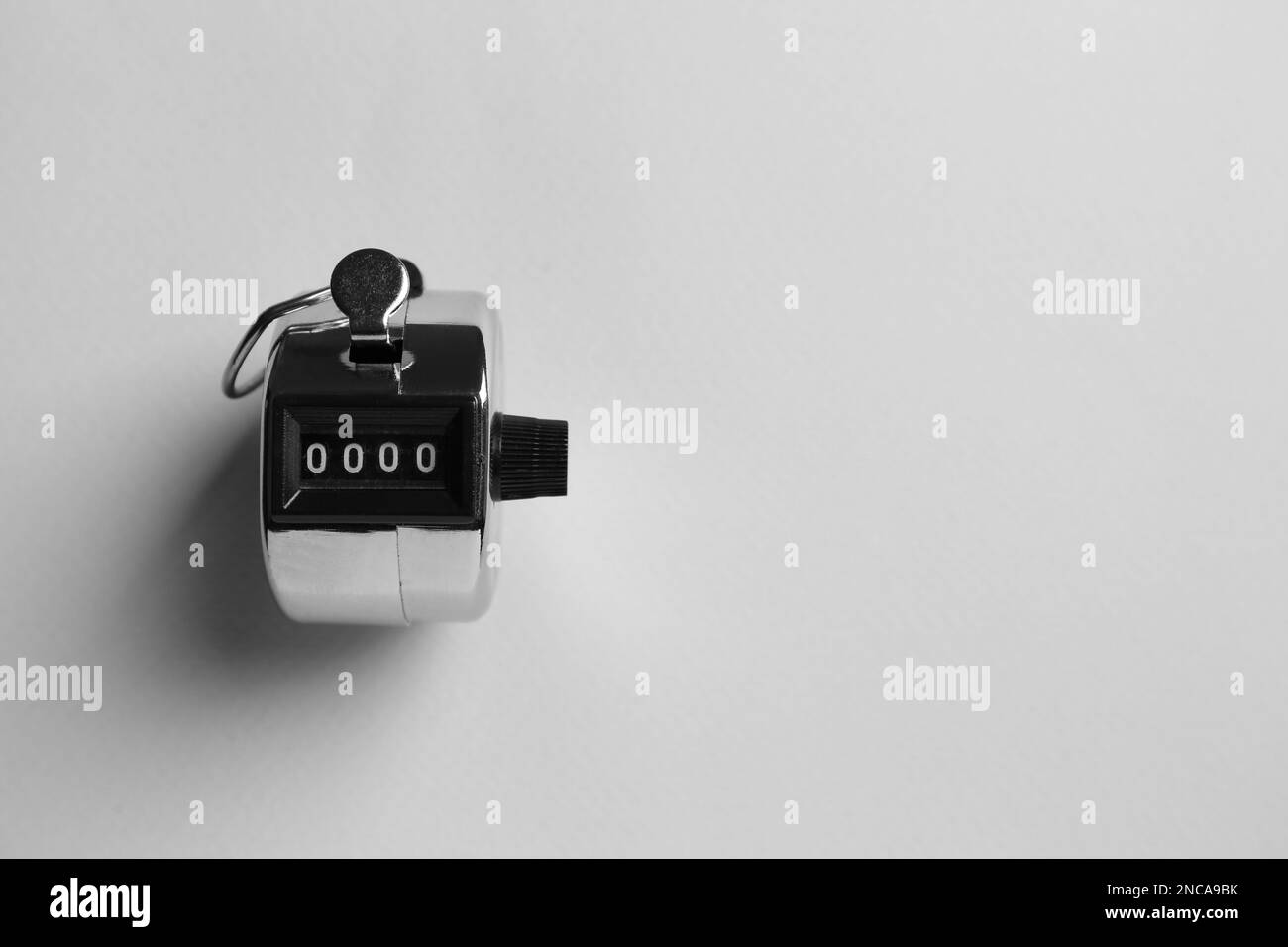 Modern timer on light grey background, top view. Space for text Stock ...