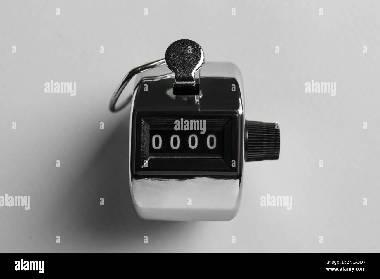 Modern timer on light grey background, top view Stock Photo - Alamy
