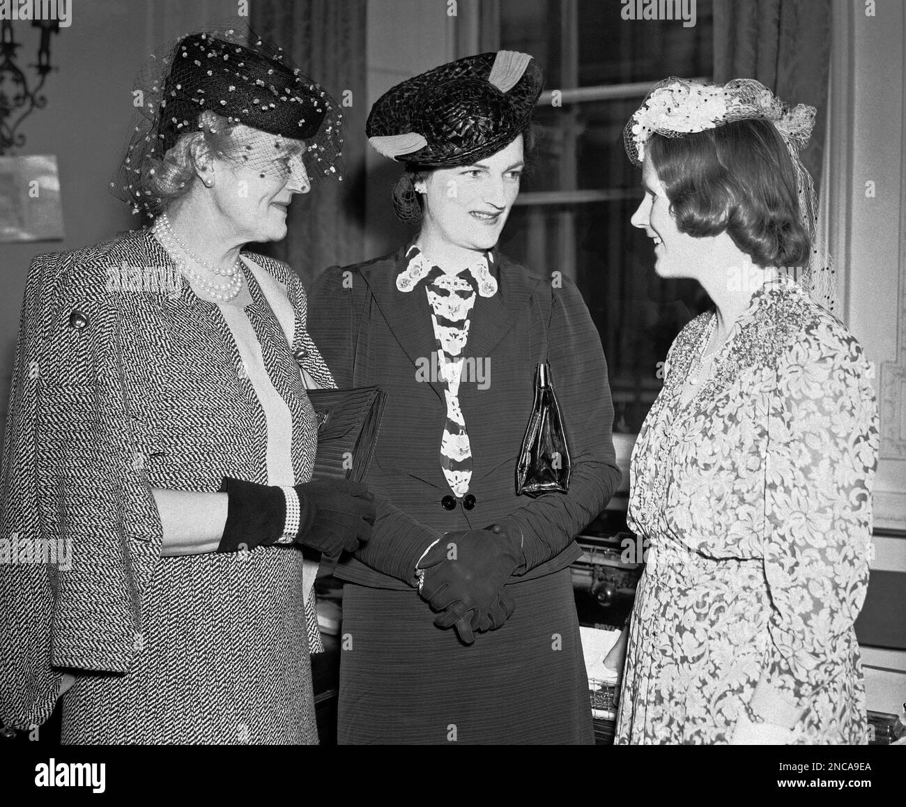 From left to right are Mrs. Clementine Churchill, Mrs. Eden, Mrs. John ...